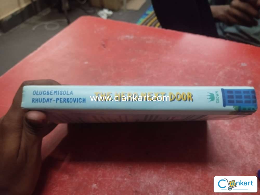 Buy 'The Hero Next Door' Book In Excellent Condition At Clankart.com